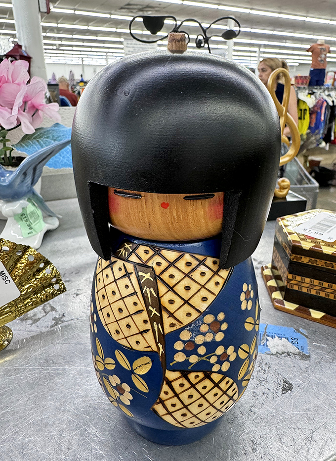 This wooden kokeshi doll isn't just decoration&mdash;it's waiting to become the conversation piece your mantel desperately needs.