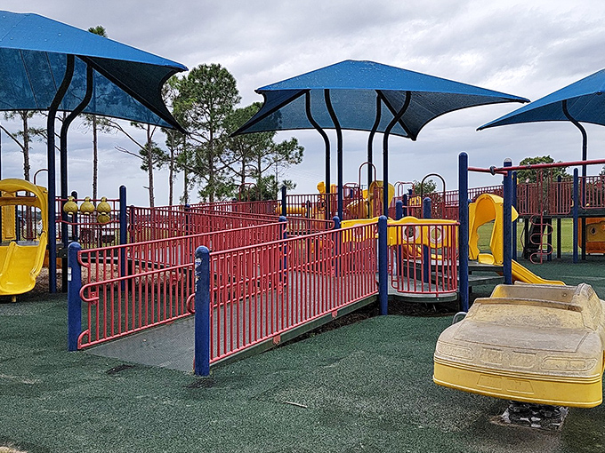 A playground where the equipment might be standard issue, but the memories made are anything but. Those blue shade sails are Florida's version of SPF 1000.