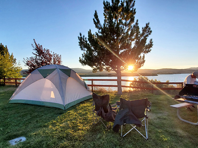 Sunrise camping perfection: When your tent has better waterfront property than most millionaires.