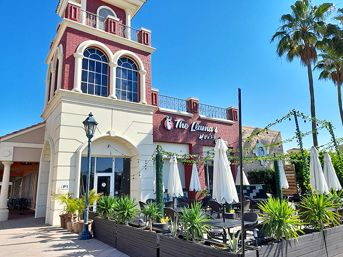 The Llamas House&rsquo;s distinctive architecture brings a touch of European flair to your shopping adventure, while its red-brick towers and outdoor seating invite you to pause between purchases.