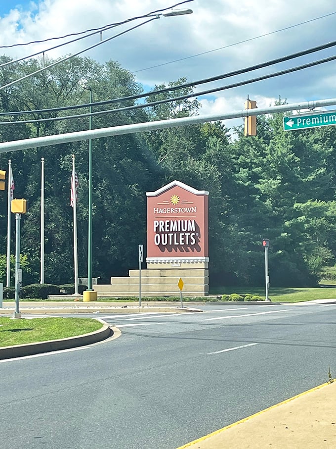 That iconic sign beckons like a retail lighthouse guiding shoppers safely to the shores of savings.