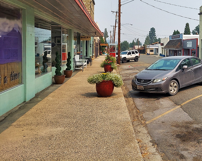 Those red planters aren't just decoration – they're Etna's version of urban planning. Charming doesn't begin to cover it.