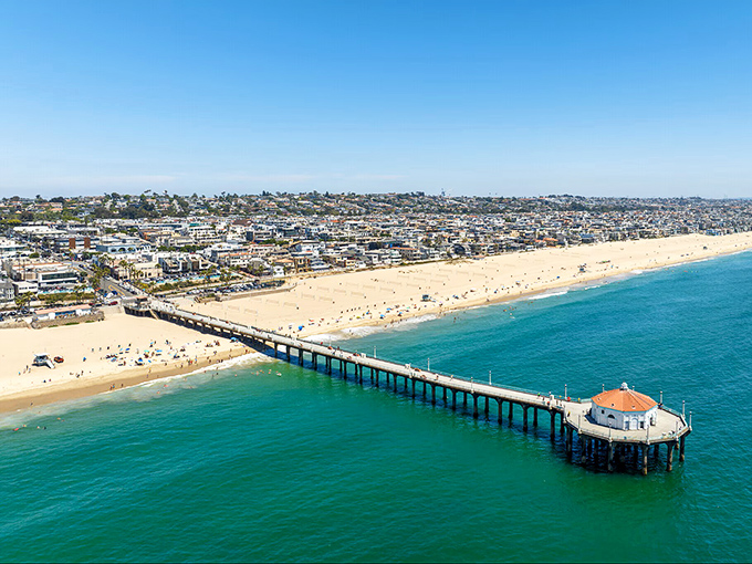 From this aerial view, the iconic pier stretches into the Pacific like a welcoming handshake from Southern California to the horizon.