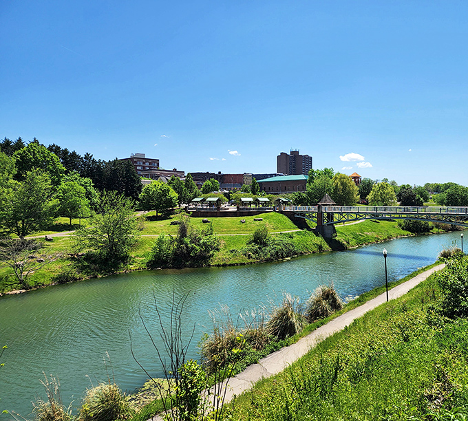 The Greenbelt's winding path alongside Pistol Creek offers a slice of nature that makes daily walks feel like mini-vacations rather than exercise.
