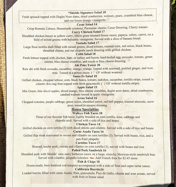 The menu reads like a love letter to California cuisine, where date-infused specialties share space with fresh seafood and vibrant salads.