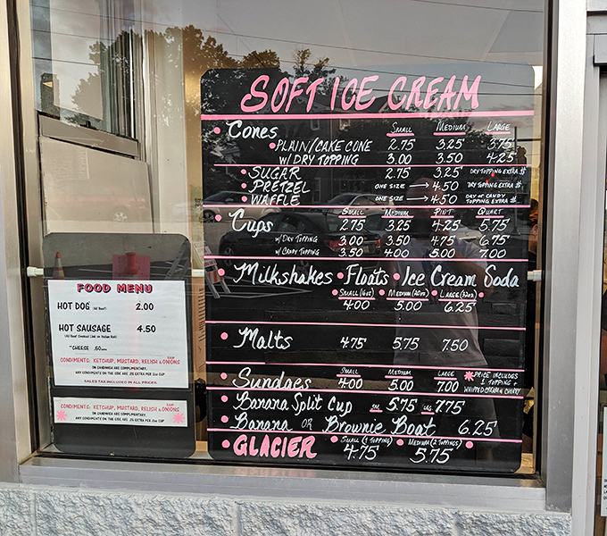 This hand-painted menu board is like a treasure map where X marks the spot for whatever frozen happiness you're craving today.