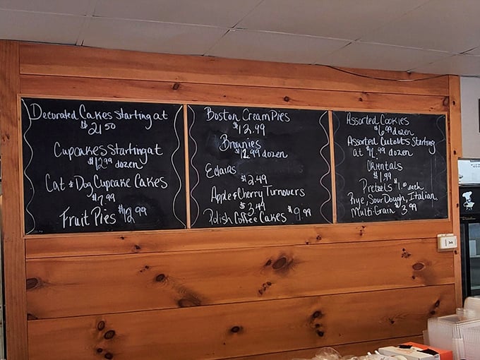 This handwritten chalkboard menu reads like poetry for your taste buds, featuring Boston cream pies and eclairs worth writing home about.