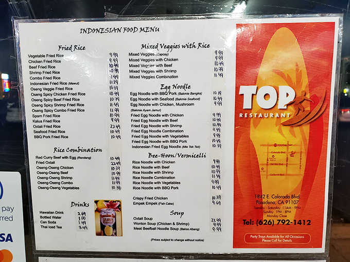 The menu reads like a treasure map of Indonesian delights, each item a potential revelation for your taste buds.