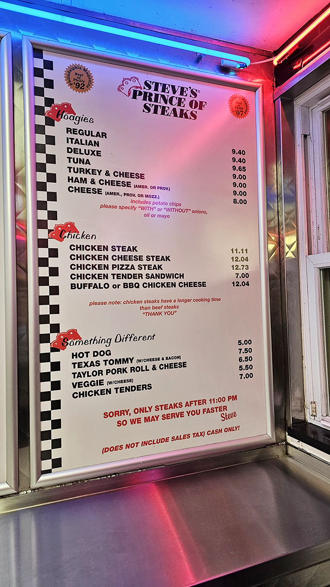 The menu board tells a simple story: no frills, no gimmicks, just Philadelphia's beloved sandwiches executed with precision and respect.