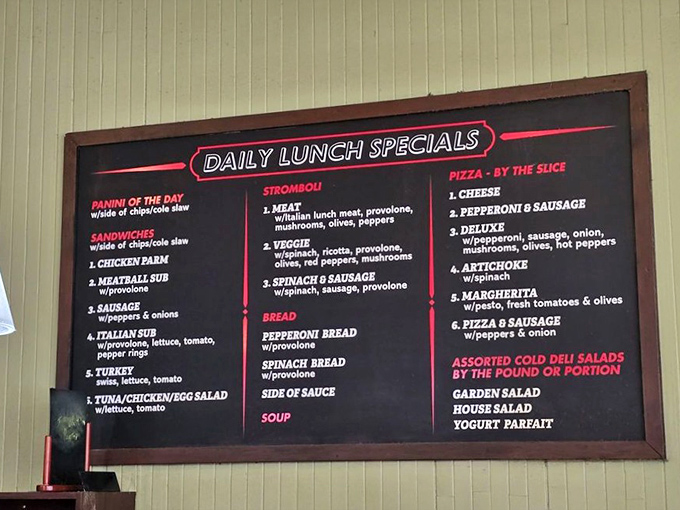 The lunch menu board reads like a love letter to Italian-American classics. Each option promises the kind of midday satisfaction that makes afternoon meetings bearable.