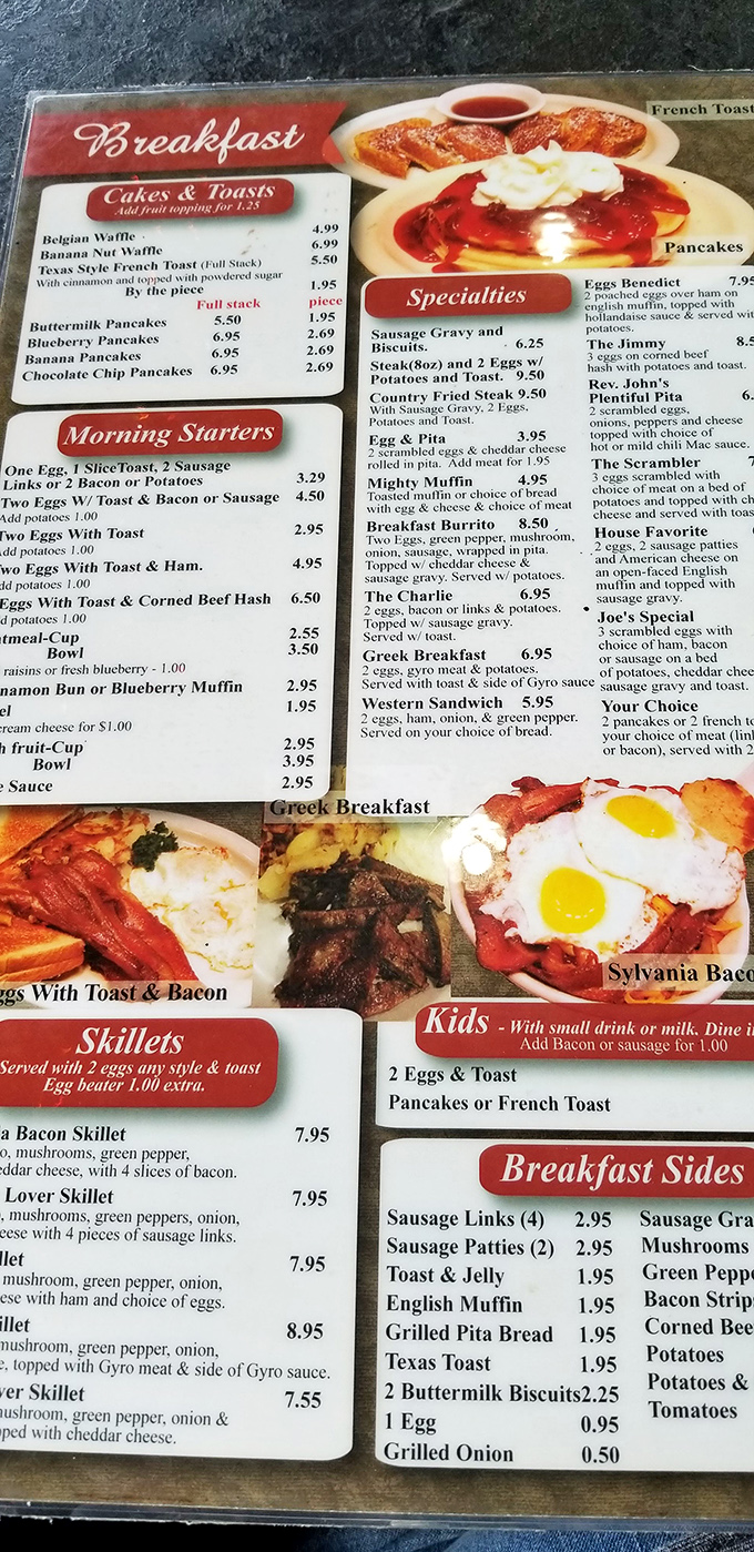The breakfast menu&mdash;a laminated masterpiece where every option feels like it was personally selected by your grandmother who wants to fatten you up.
