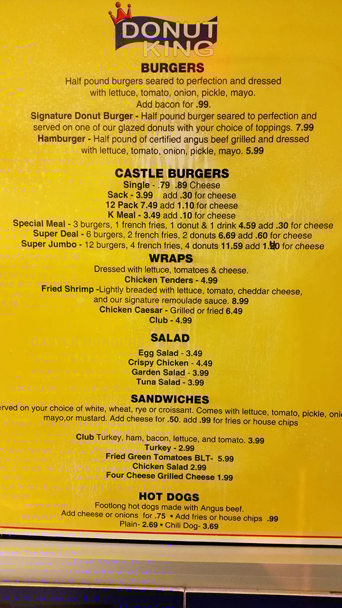 The menu reveals Donut King's split personality&mdash;half sweet paradise, half savory haven. That Donut Burger isn't just a novelty, it's a revelation.