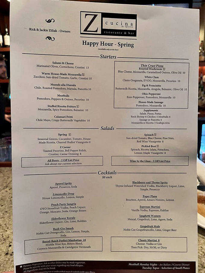 The happy hour menu reveals Z Cucina's true character—thoughtful Italian classics alongside creative cocktails. Those meatballs are calling my name!