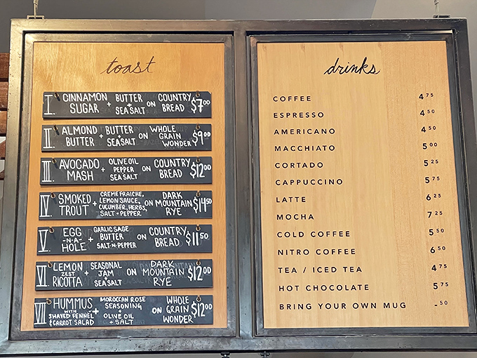A menu so straightforward it's revolutionary. No QR codes, no apps, just honest food written on honest wood—the way menus were meant to be.