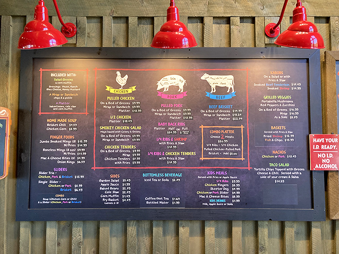 The menu board tells the delicious story—chicken, pork, and beef prepared with care, plus all the sides that make BBQ a complete experience.