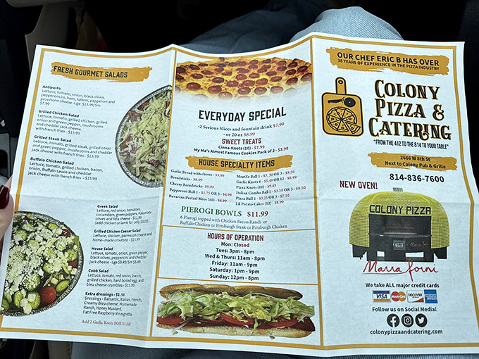 The menu reveals Colony's true ambitions: from pierogi bowls to gourmet salads, this isn't just another pizza joint.