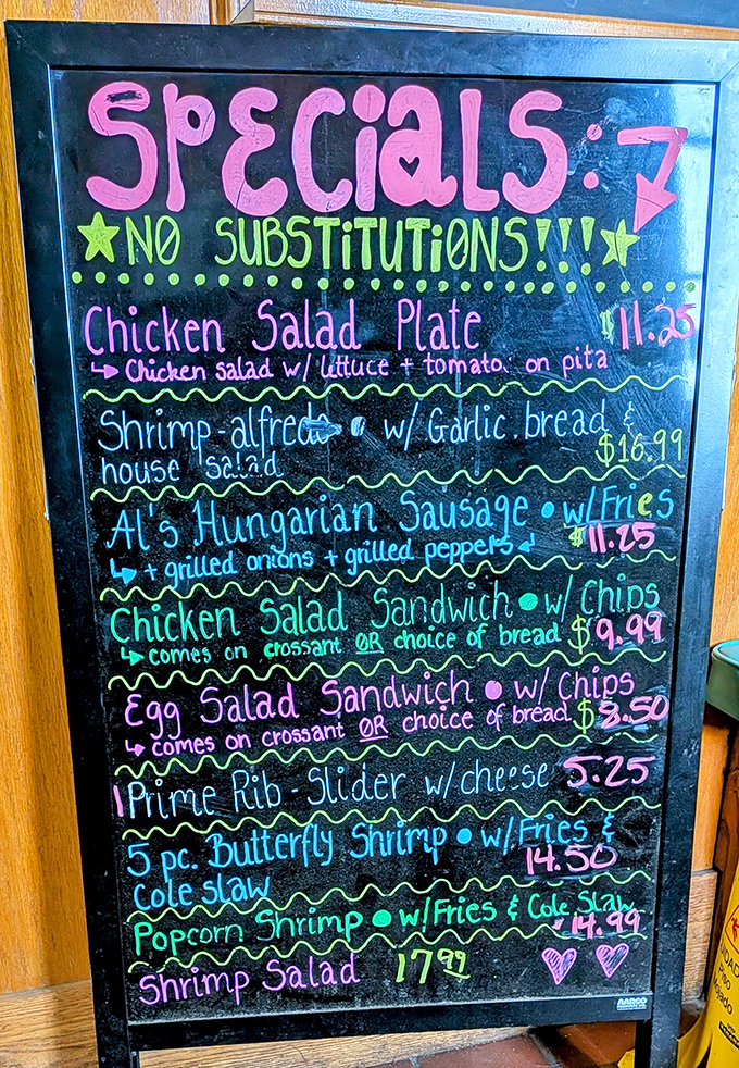 The neon-bright specials board doesn't just list food&mdash;it's a handwritten love letter to hungry patrons with its "NO SUBSTITUTIONS!!!" battle cry of culinary confidence.