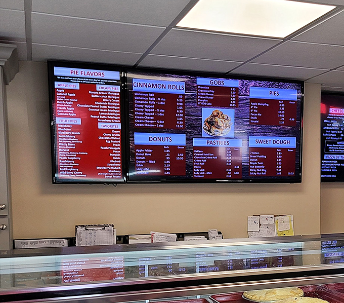 The digital menu board reads like a love letter to carbs, with enough options to require multiple visits or one gloriously indulgent afternoon.