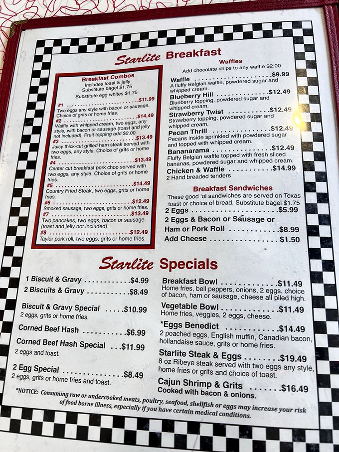 The menu at Starlite reads like a love letter to American breakfast classics. That checkered border isn't just decoration&mdash;it's a warning that diet plans come here to die.