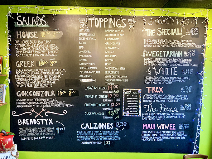 The chalkboard menu—a work of art itself—showcases Moon River's creative offerings. From White Pizza to T-Rex, decisions have never been so deliciously difficult.