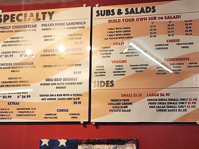 The menu board reads like a love letter to comfort food classics, with that legendary Philly cheesesteak proudly claiming top billing.