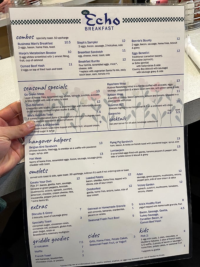 The menu reads like a love letter to breakfast classics. Notice the "Hangover Helpers" section? They know exactly why you're here on Sunday morning.