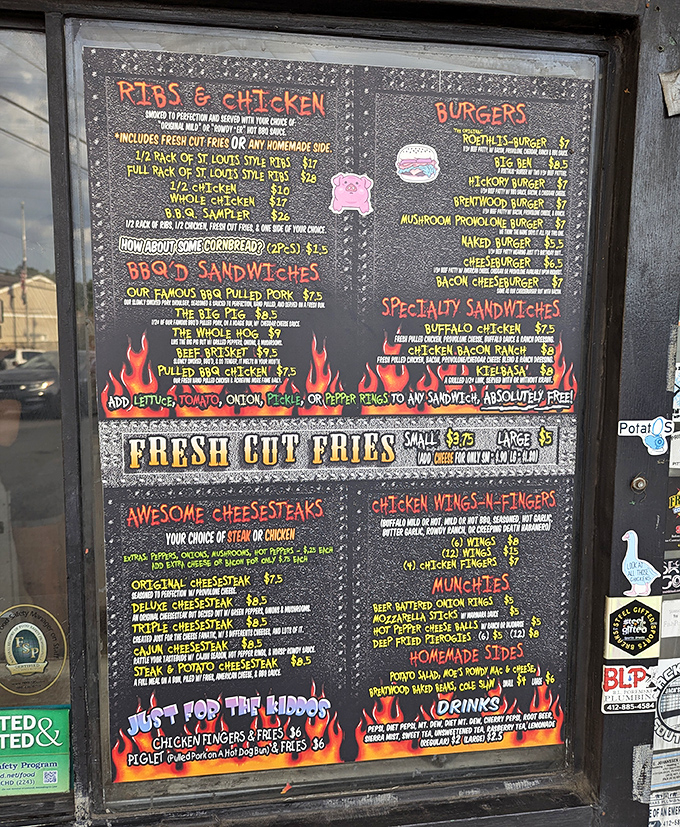 This flame-decorated menu board tells the delicious truth &ndash; BBQ isn't just a meal here, it's a full-blown flavor manifesto.