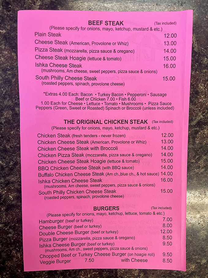 The pink menu board reads like a love letter to cholesterol, and we're here for every word.