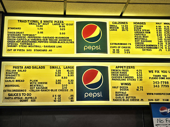 A menu board that hasn't changed in decades&mdash;because perfection doesn't need updating. The Pepsi logo might be newer than some of the recipes.