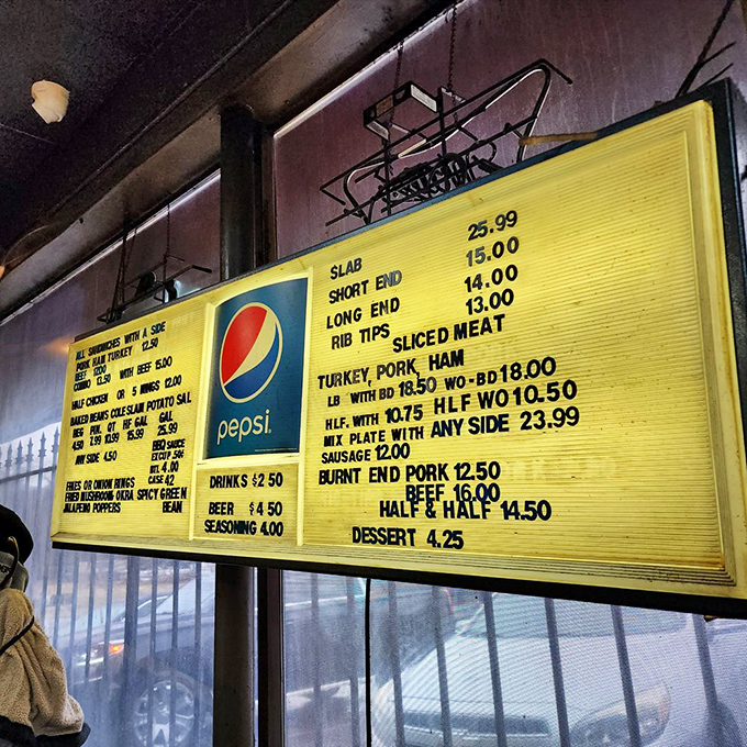 The menu board tells you everything you need to know: meat is the star, sides are the supporting cast, and decisions will be difficult.