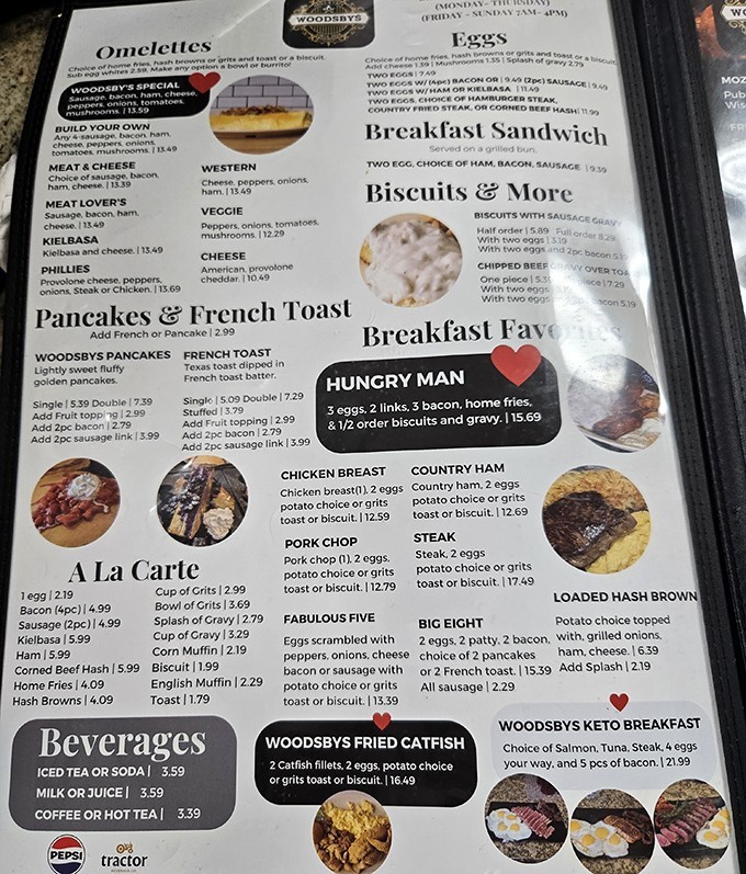 A menu that reads like morning poetry—omelets, pancakes, and fried catfish all vying for your first bite of the day.