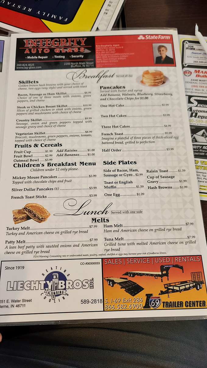 Between local business ads and breakfast specials, this menu tells you everything you need to know about small-town priorities: good food, fair prices, no fuss.