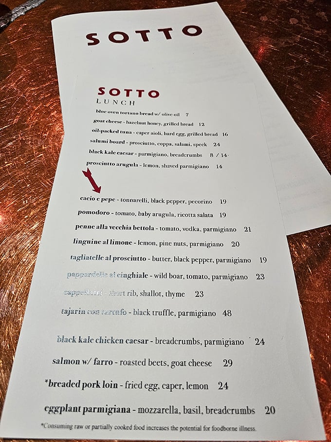 A menu that reads like poetry for the hungry soul. Each dish promises a story told through generations of Italian culinary tradition.
