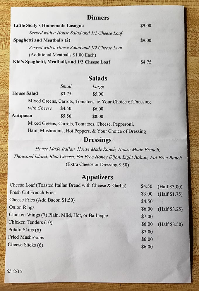 A menu where prices seem frozen in time. Nine dollars for homemade lasagna with salad and cheese bread? That's not a meal, that's a miracle. 