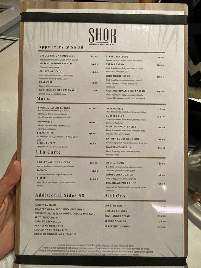 A menu that reads like a love letter to the Gulf—where deciding between the Lobster Mac & Cheese and Catfish Court Bouillon feels like Sophie's Choice.