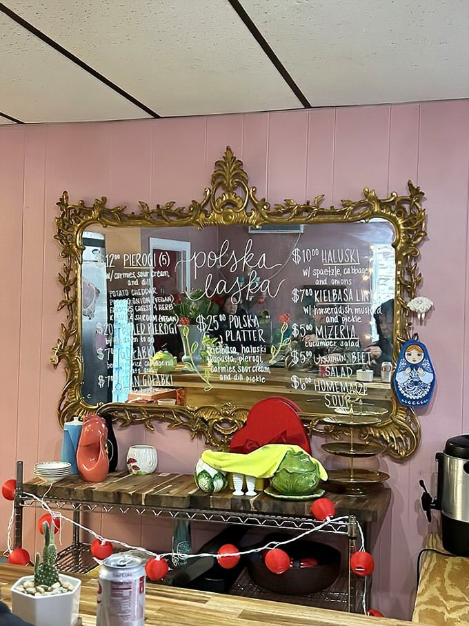 That ornate gold-framed mirror menu isn't just showing prices&mdash;it's offering a portal to Polish culinary paradise.