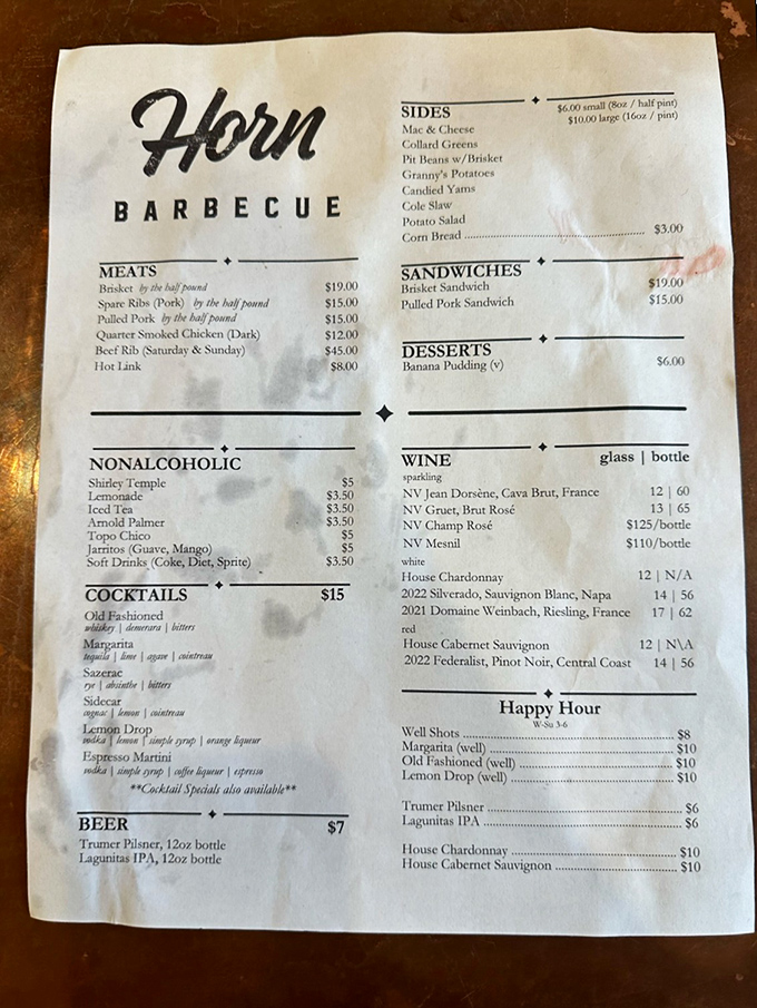 A menu that reads like barbecue poetry: brisket, pulled pork, spare ribs, and sides that aren't afterthoughts but essential supporting characters in this meaty drama.