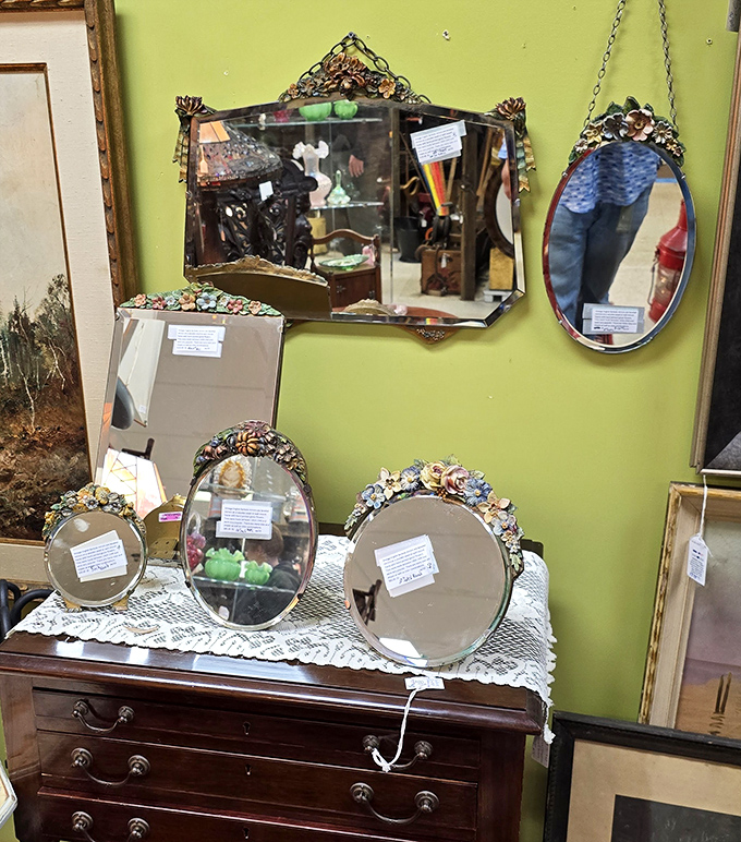 Mirrors that have reflected a century of faces now wait for yours. Each frame tells its own ornate story.