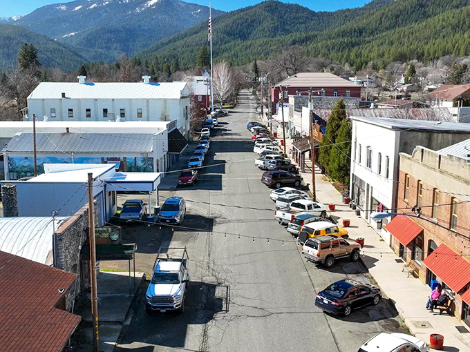Downtown Etna's aerial view showcases its classic grid layout, where cars park diagonally and mountains frame every selfie opportunity.