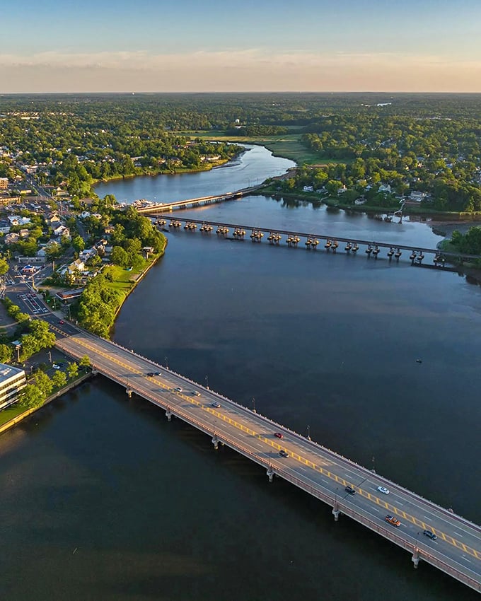 The Navesink River winds gracefully through Red Bank's landscape, with bridges connecting communities and creating postcard-worthy vistas at every turn.