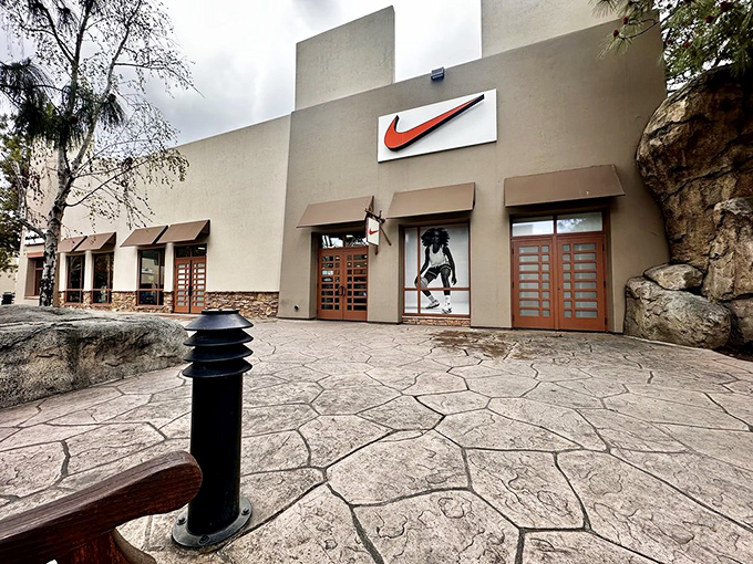 The Nike store stands like a temple to athletic aspiration, where weekend warriors and serious athletes alike find their soles... and souls.