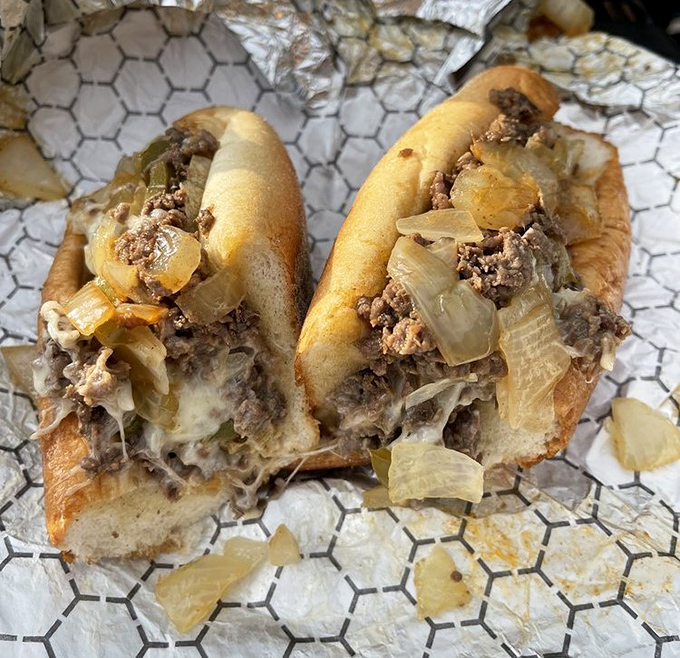 Behold the star of the show &ndash; thinly chopped ribeye, melted cheese, and caramelized onions nestled in a perfect roll. Poetry in sandwich form.