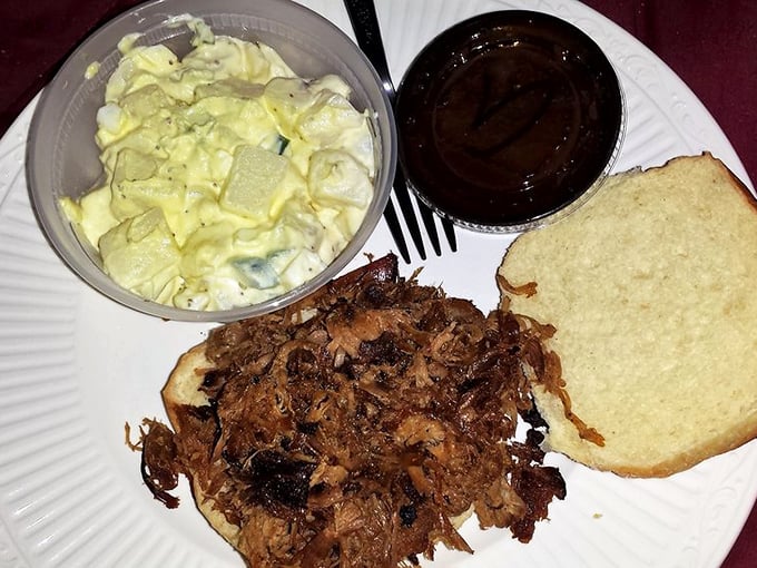 The star of the show: pulled pork with perfect bark, accompanied by creamy potato salad and sauce that's practically begging to join the party. 