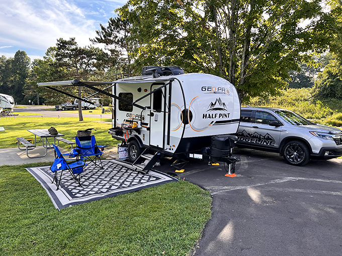 Glamping goals achieved! This compact camper setup proves you don't need a mansion to feel at home in nature's backyard.