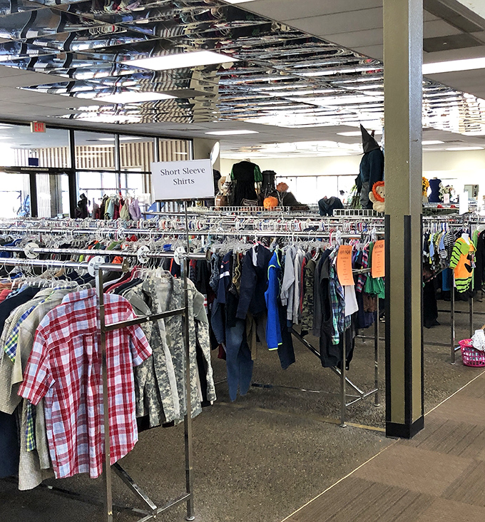 The clothing section: where your next favorite shirt is hiding between someone else's past fashion choices. Color-coded for the organizationally obsessed.