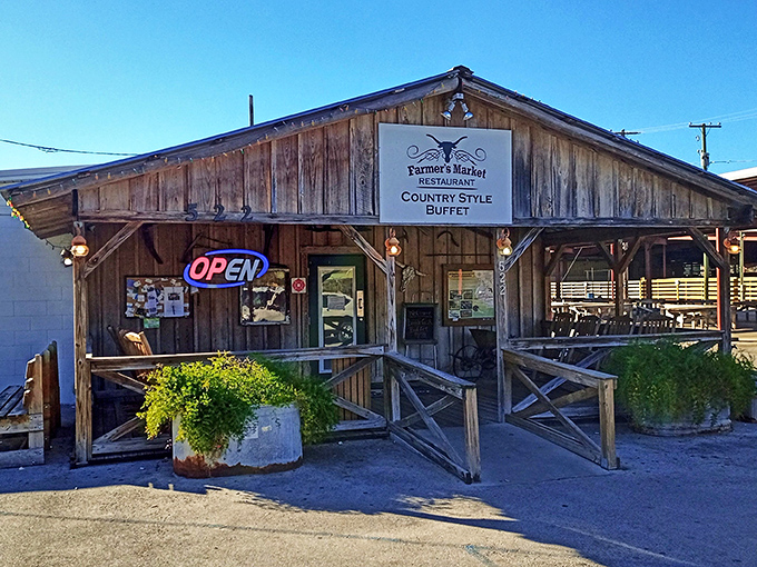 The Farmer's Market Restaurant promises country-style buffet dining in a rustic wooden setting that screams "authentic" louder than any chain restaurant ever could.