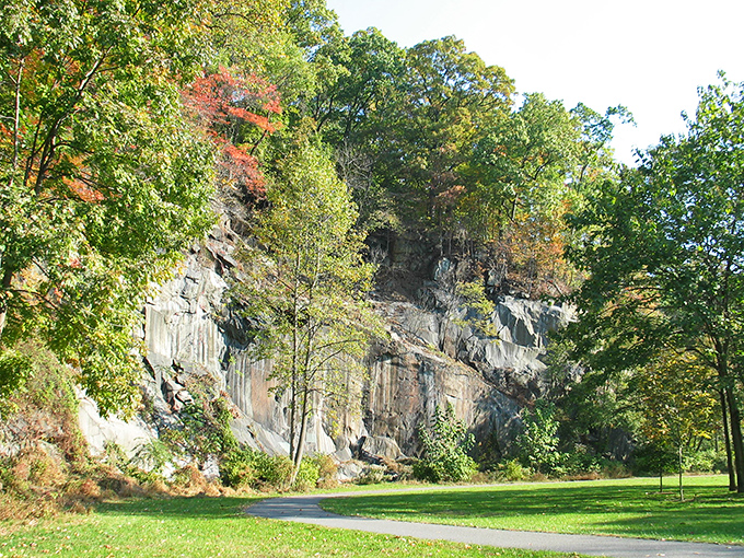 Mother Nature's art gallery: ancient rock formations stand as silent sentinels, their faces etched by millions of years of geological drama.