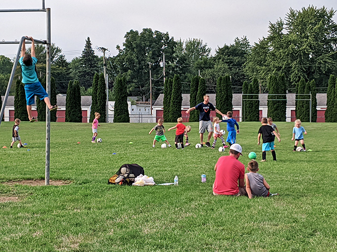 Community soccer fields where future World Cup dreams take shape alongside parents creating memories that outlast any professional contract.