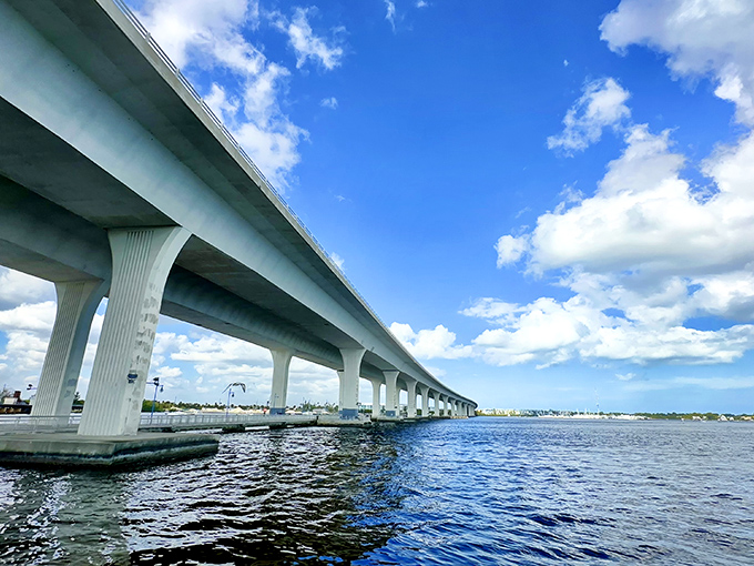 The Roosevelt Bridge stretches across brilliant blue waters like a concrete rainbow, connecting Stuart's communities while framing postcard-worthy views.