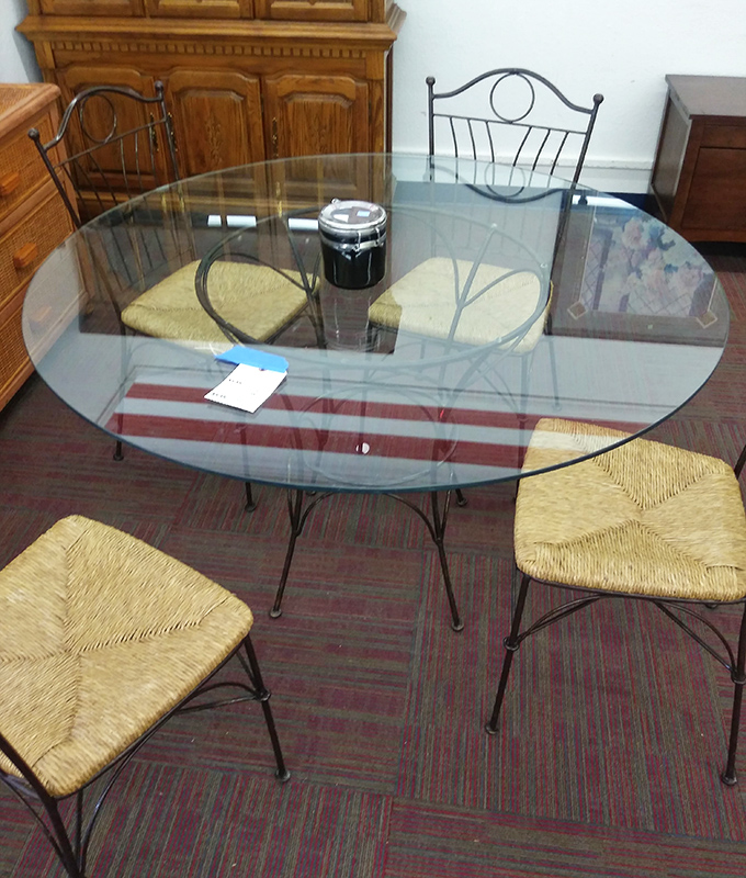 Elegant meets affordable with this glass-top dining set. Someone's dinner party loss is about to become your entertaining gain!